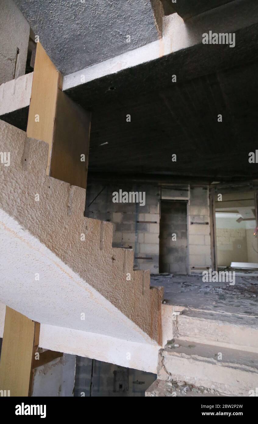 Staircase of an abandoned ruined building at the Jerma Palace Hotel in ...