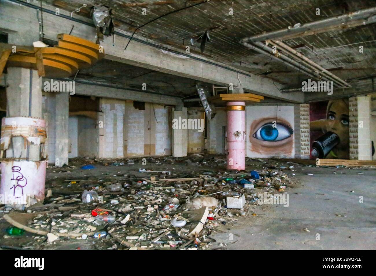Abandoned ruined building with pillars and a graffiti eye. Jerma Palace ...