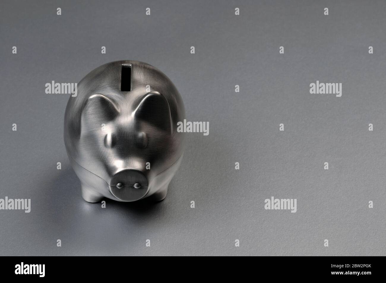 A metal piggy bank Stock Photo - Alamy