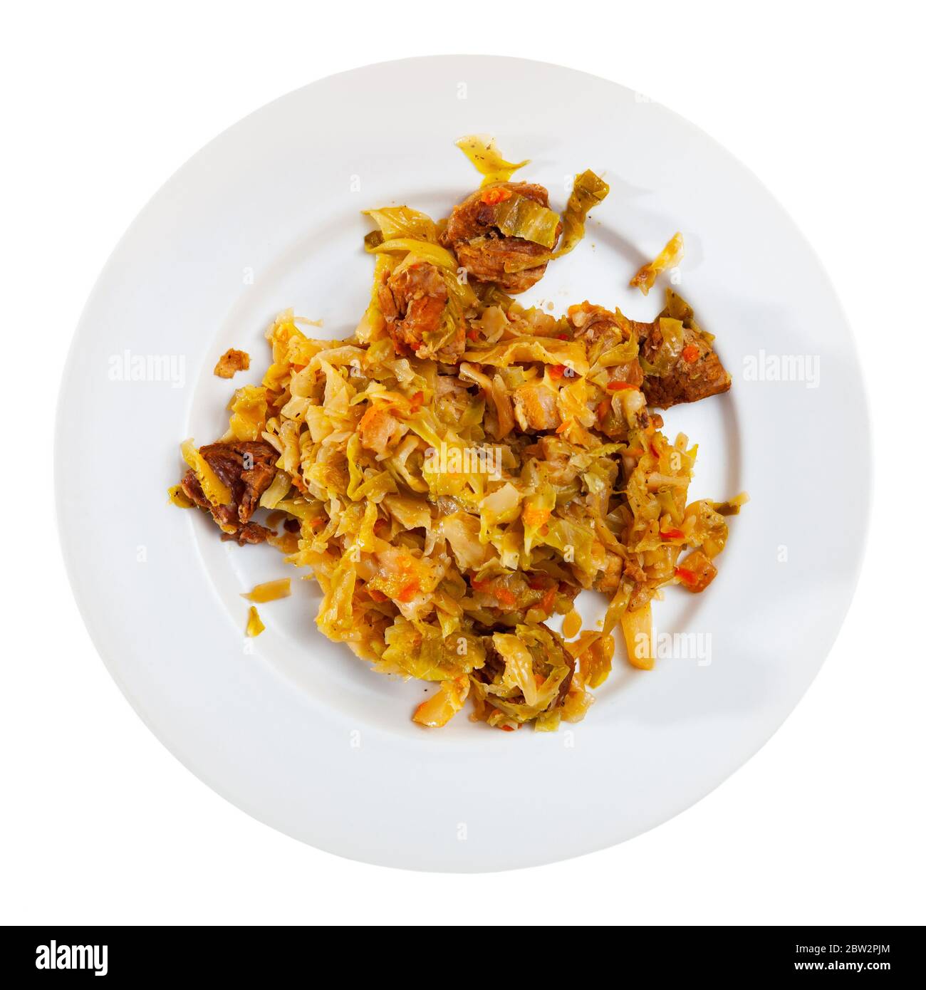 Home style stew of cabbage with pieces of pork. Traditional Ukrainian ...
