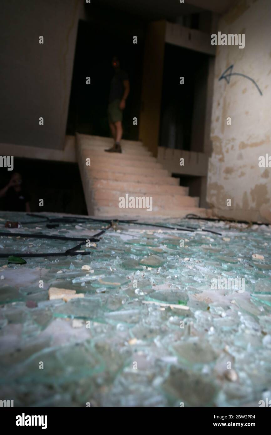 Broken glass window on the floor in an abandoned building Stock Photo ...