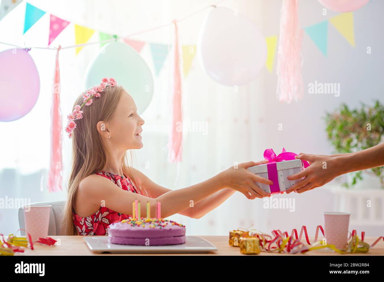 Caucasian girl is dreamily smiling. Festive colorful background with ...