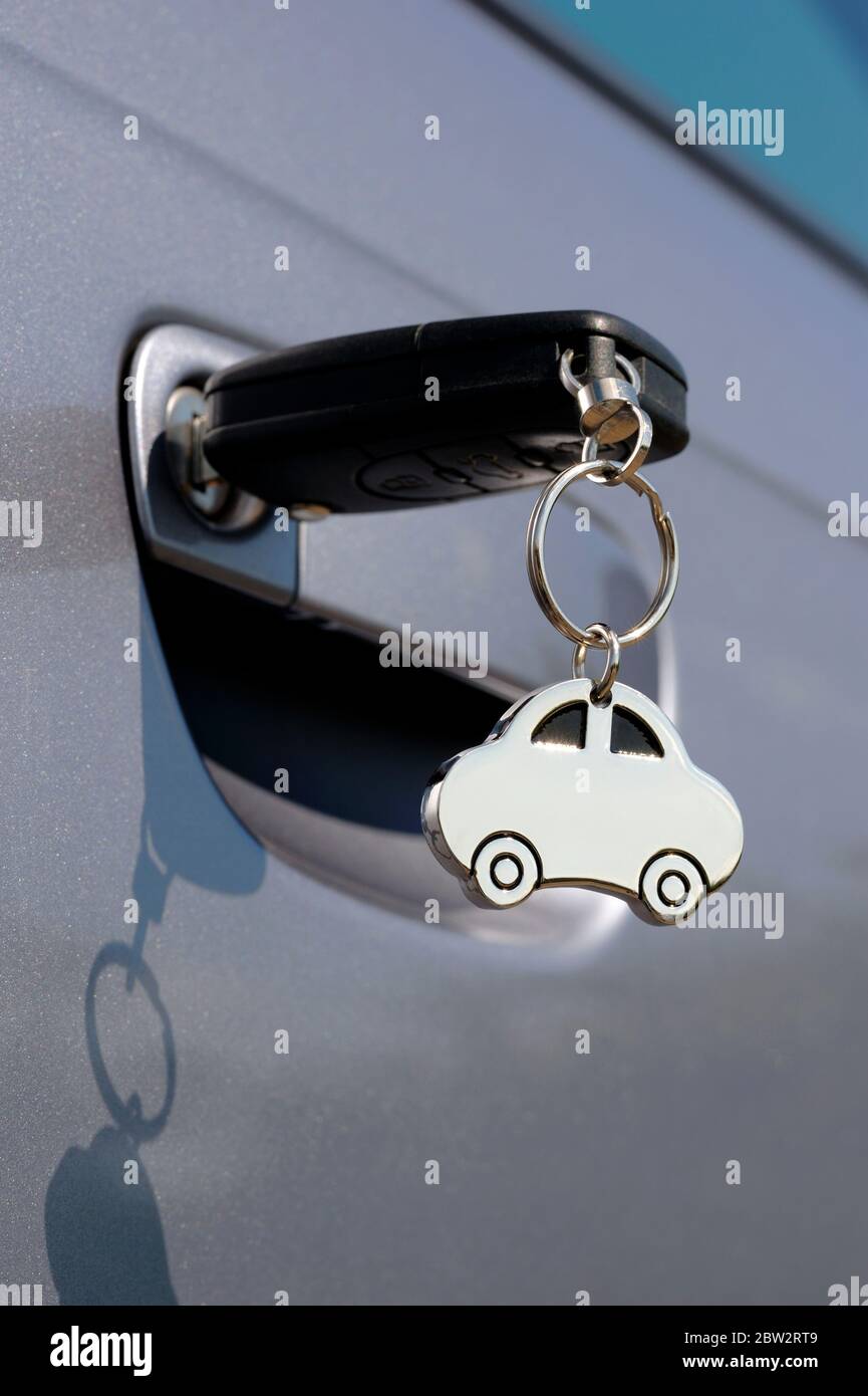 A car shaped keying in a car door Stock Photo - Alamy