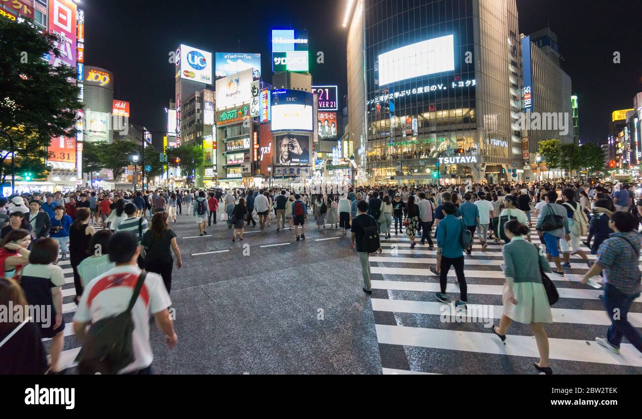 Shibuya crowd and illuminated signs Stock Photo - Alamy