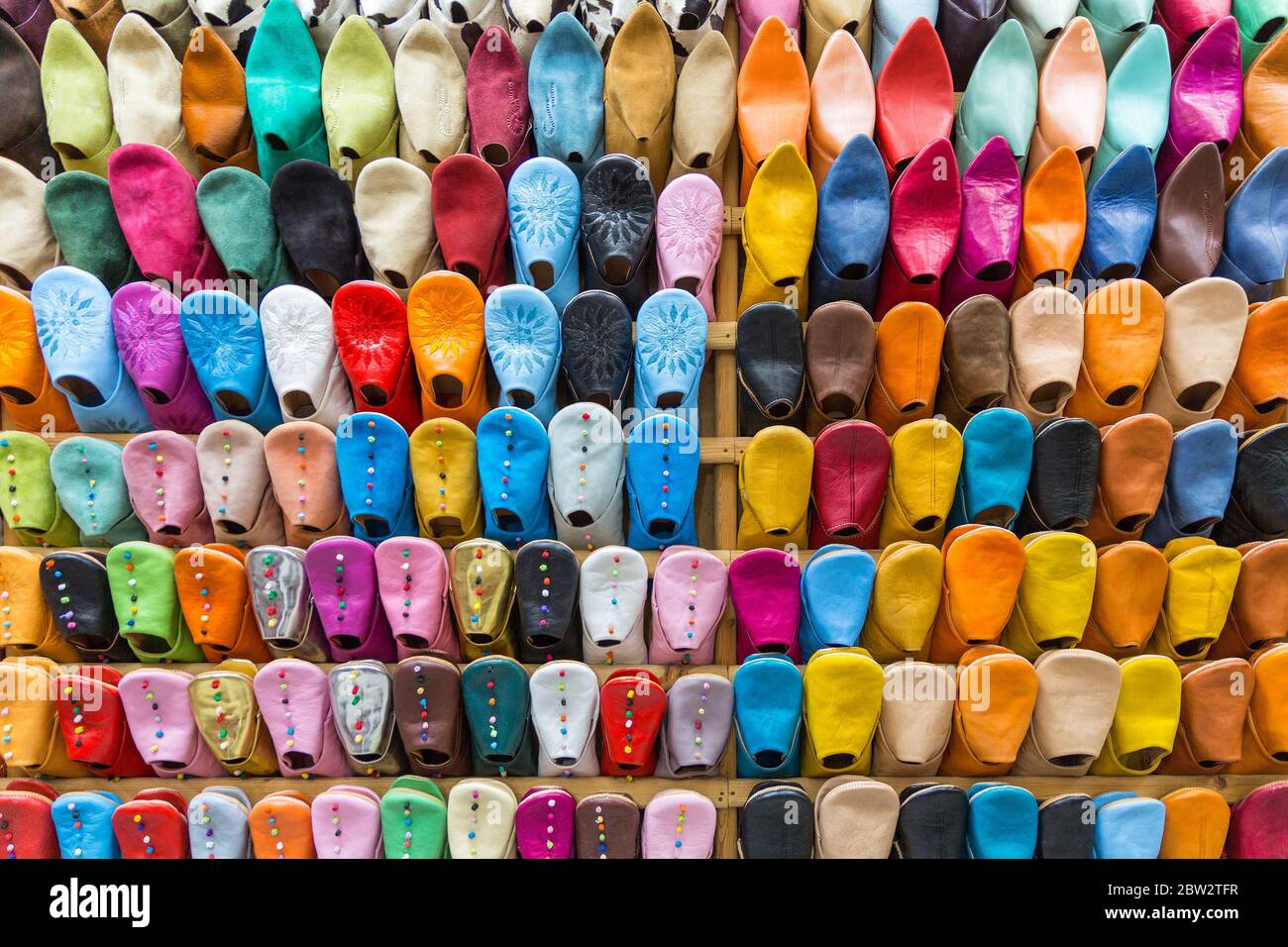 Colourful Slippers wall Stock Photo - Alamy