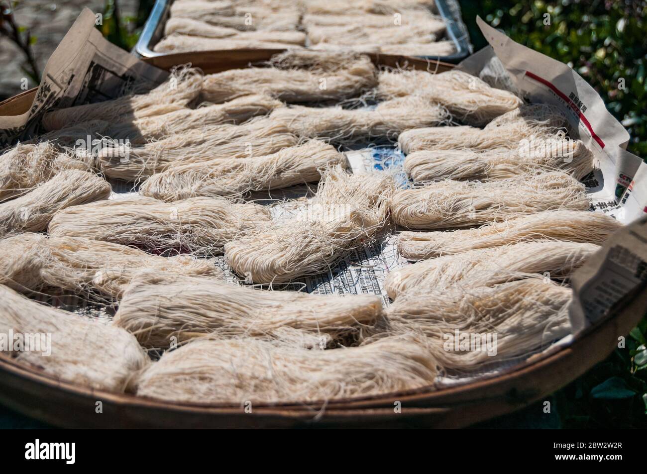 Rice noodles drying in the sun on Gu Mountain (Gushan) in the hills ...