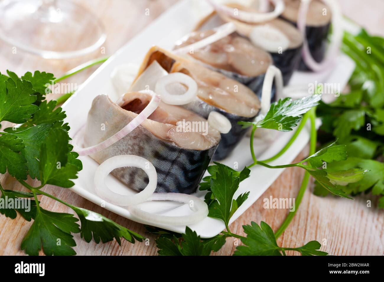 Image of sliced lightly salted mackerel fish served with onion and ...