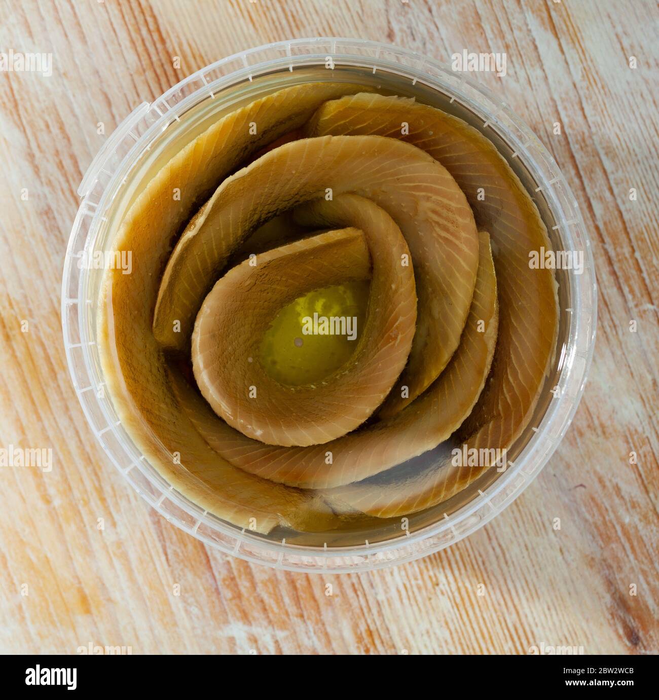 Preserved sardines marinated in oil in plastic container Stock Photo ...
