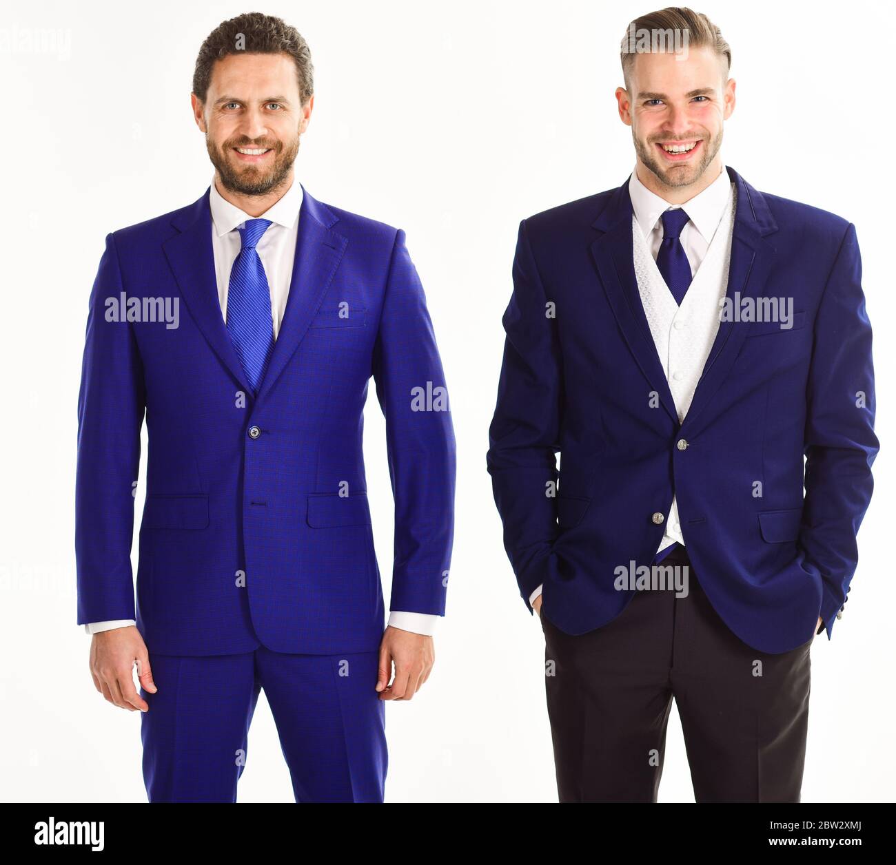 Business partners or boss and employe in suits with smiling faces ...