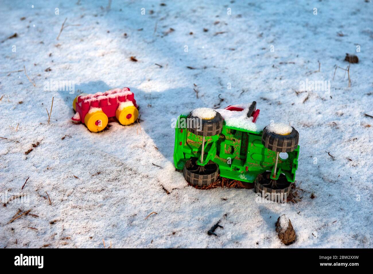 Abandoned or lost toy lies on the snow. Concept of loneliness ...