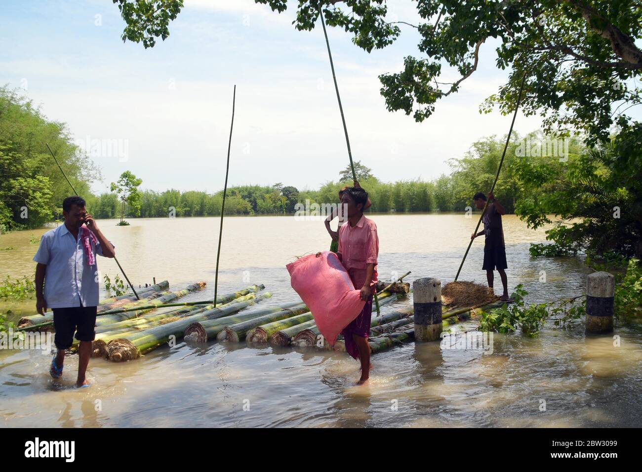 Nagaon, Assam / India - May 29 2020: Villagers shifting food grains to ...