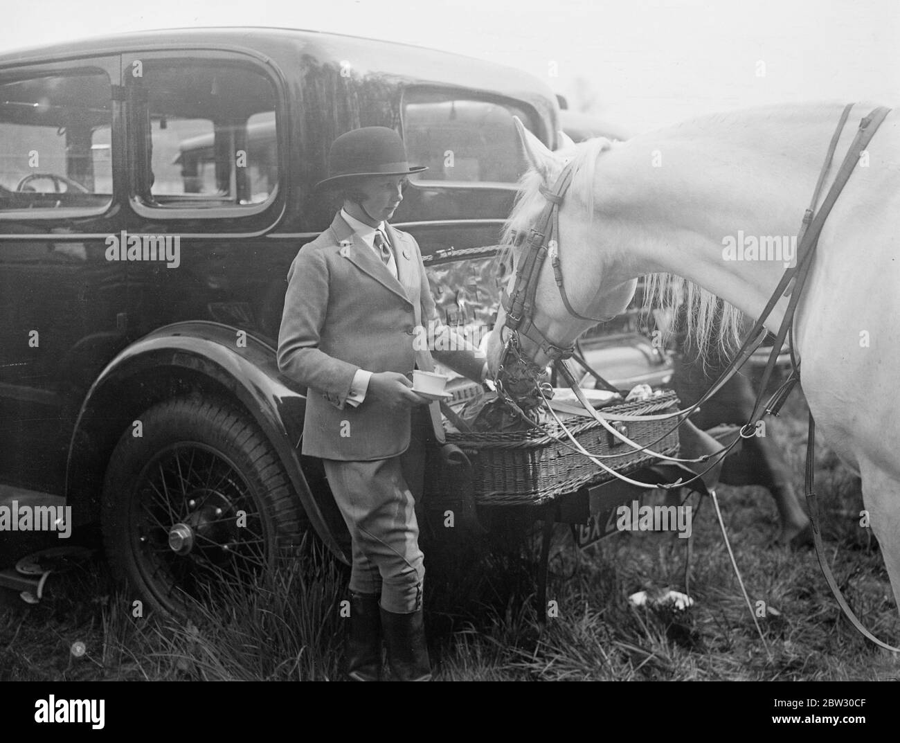 A snack from the picnic basketat equestrian club gymkhana . Miss Anne ...