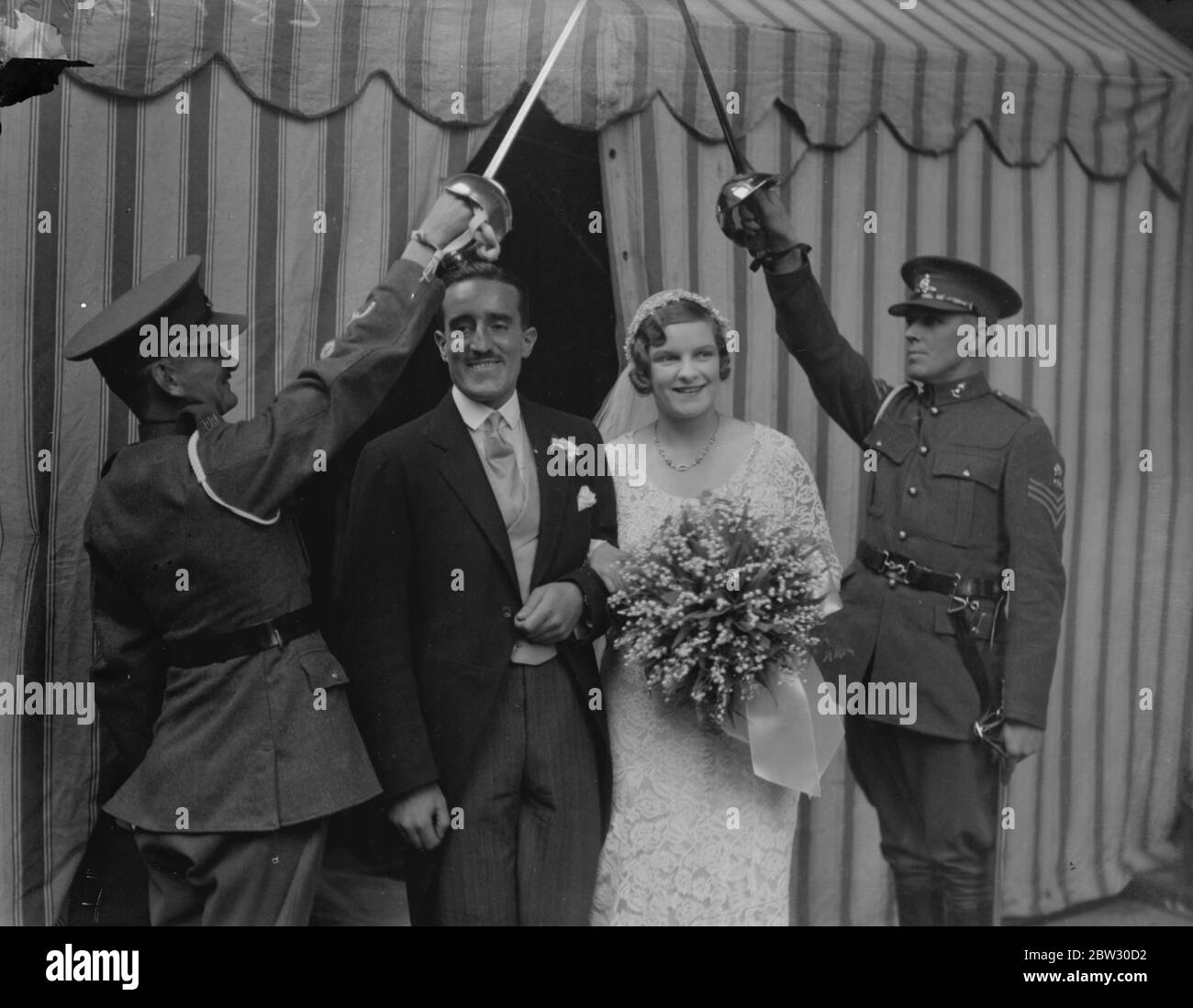 A smiling bride . Military wedding at St Georges , Hanover Square . The ...