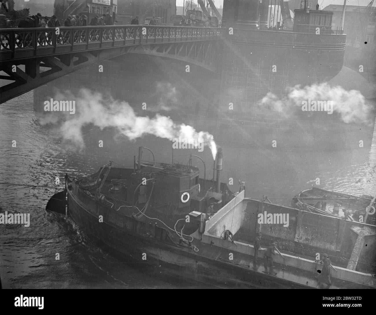 Repairs carried out to river bed beneath tower bridge . Repair work is ...