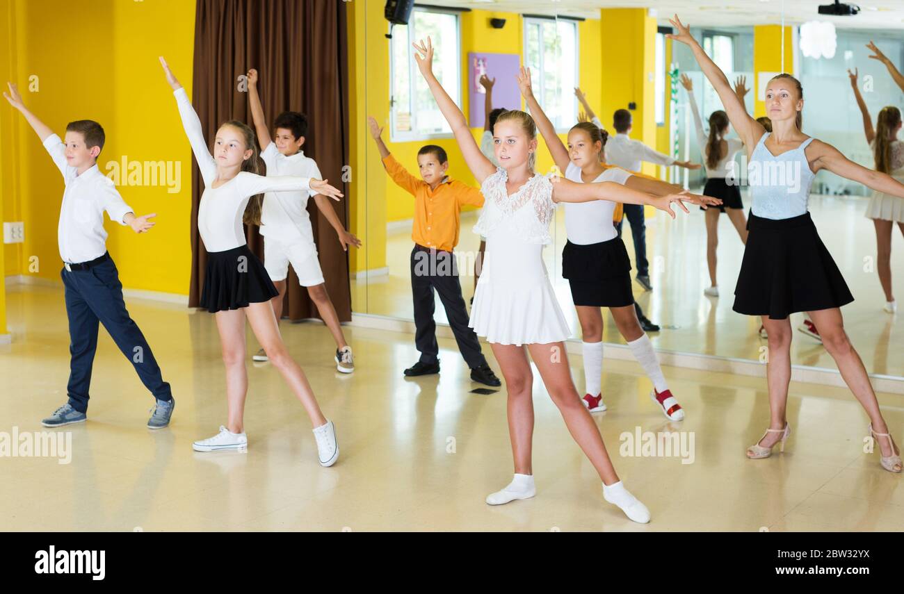 Emotional children posing at dance class Stock Photo - Alamy