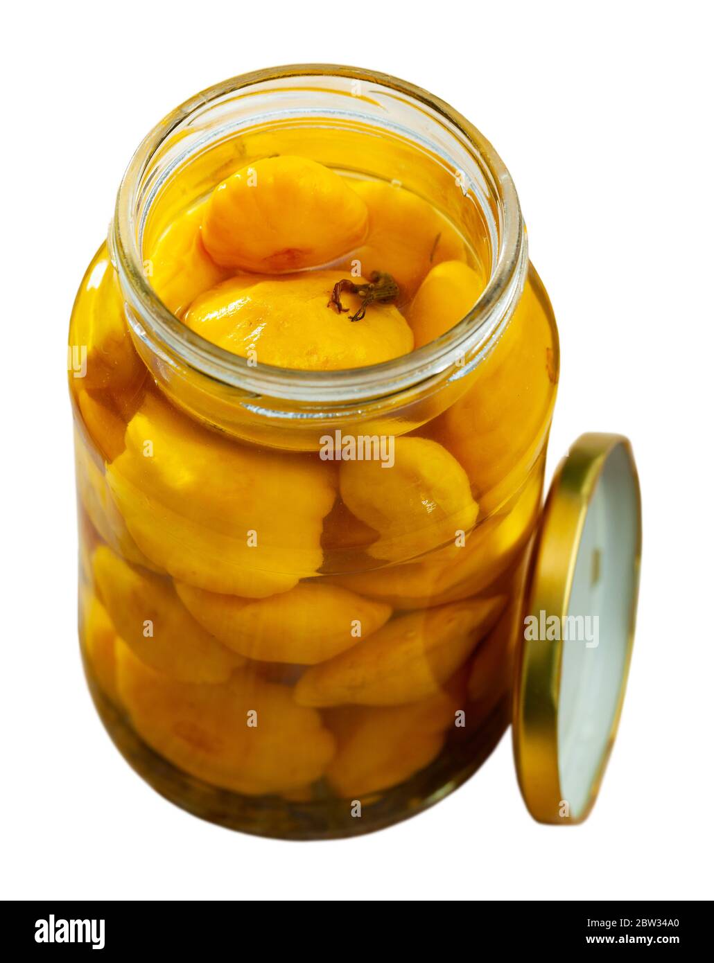 Image of pickled squash in glass jar. Isolated over white background ...