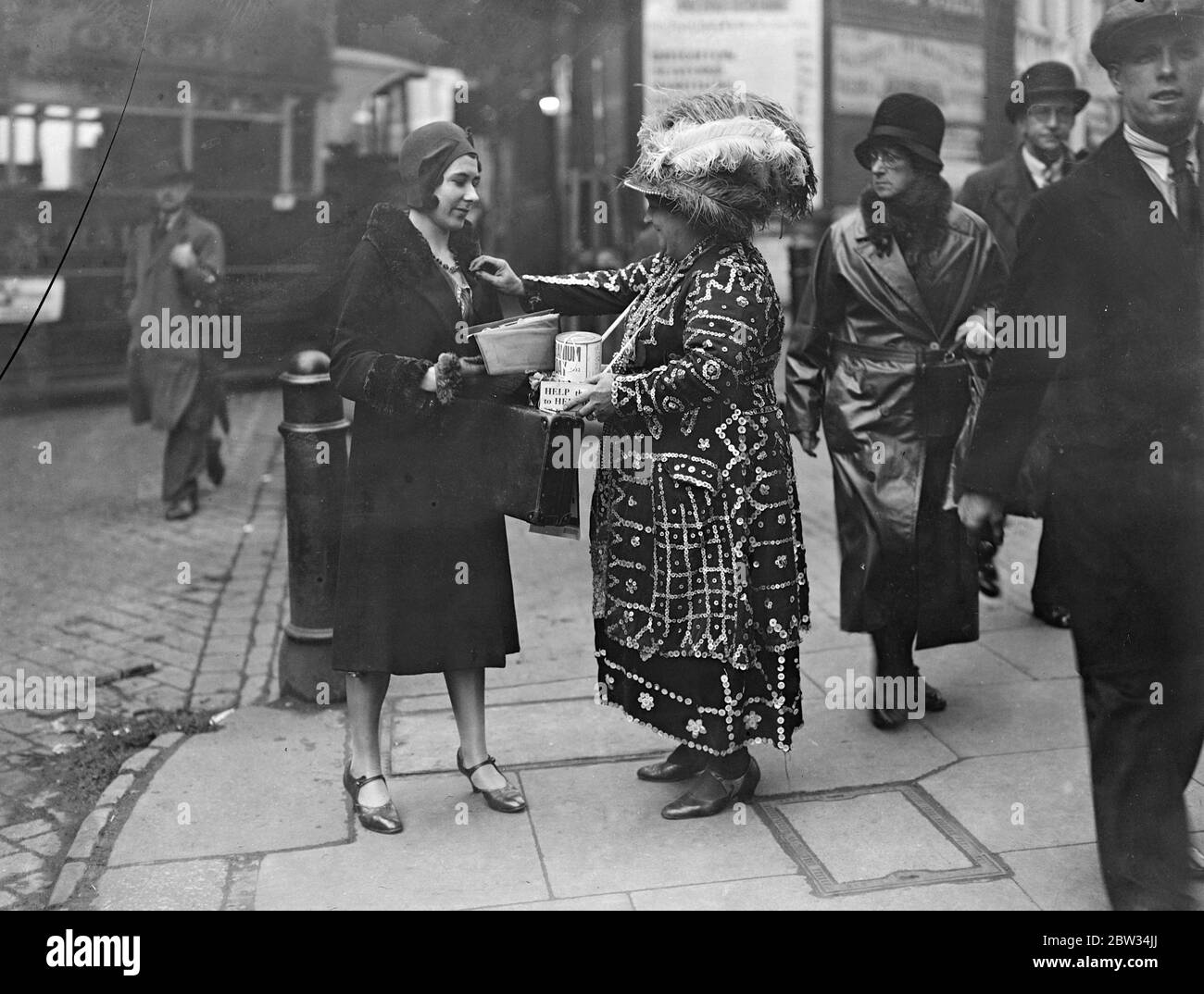 Southwark Pearly Queen collects for the blind . Mrs P Ramswell , the ...