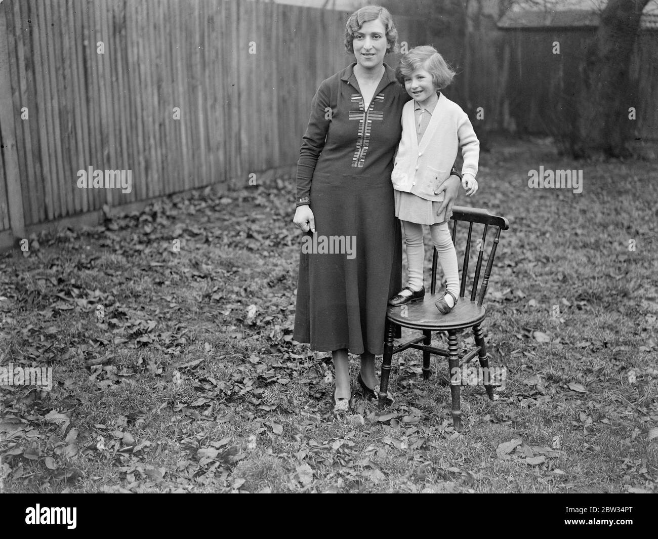Woman watching fire Black and White Stock Photos & Images - Alamy