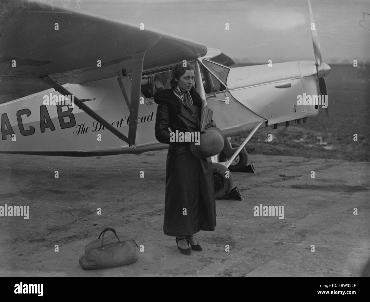 Mrs Mollison ( Amy Johnson ) lands in Africa a day ahead of her husband ...