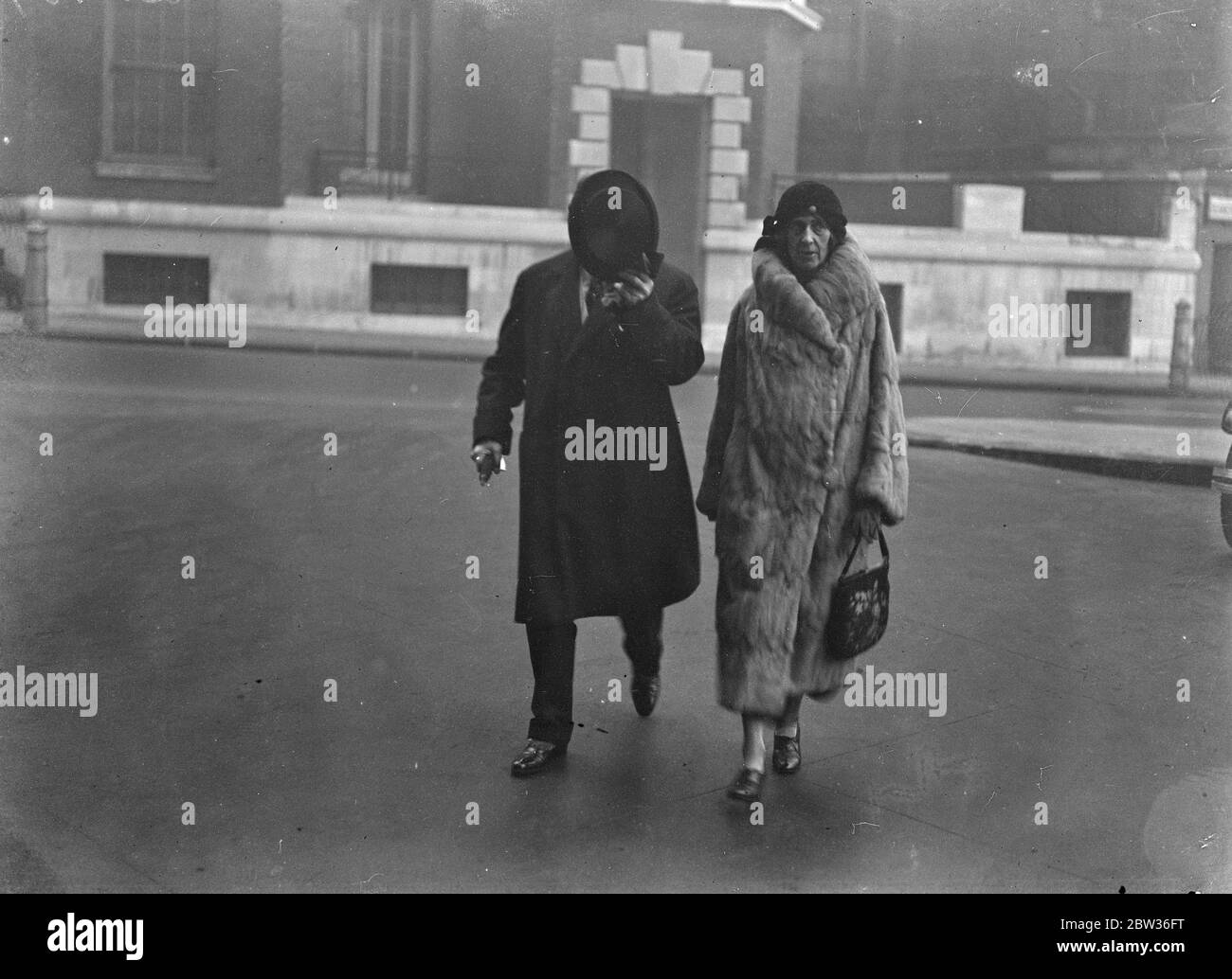 Lord Rendlesham attempts to evade photographers on visit to London with ...