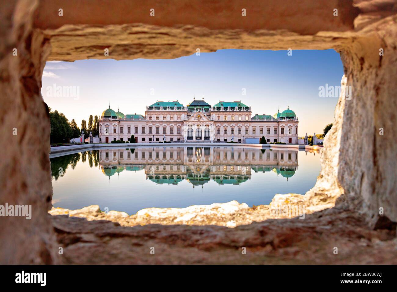 Belvedere in Vienna water reflection view through stone window at ...