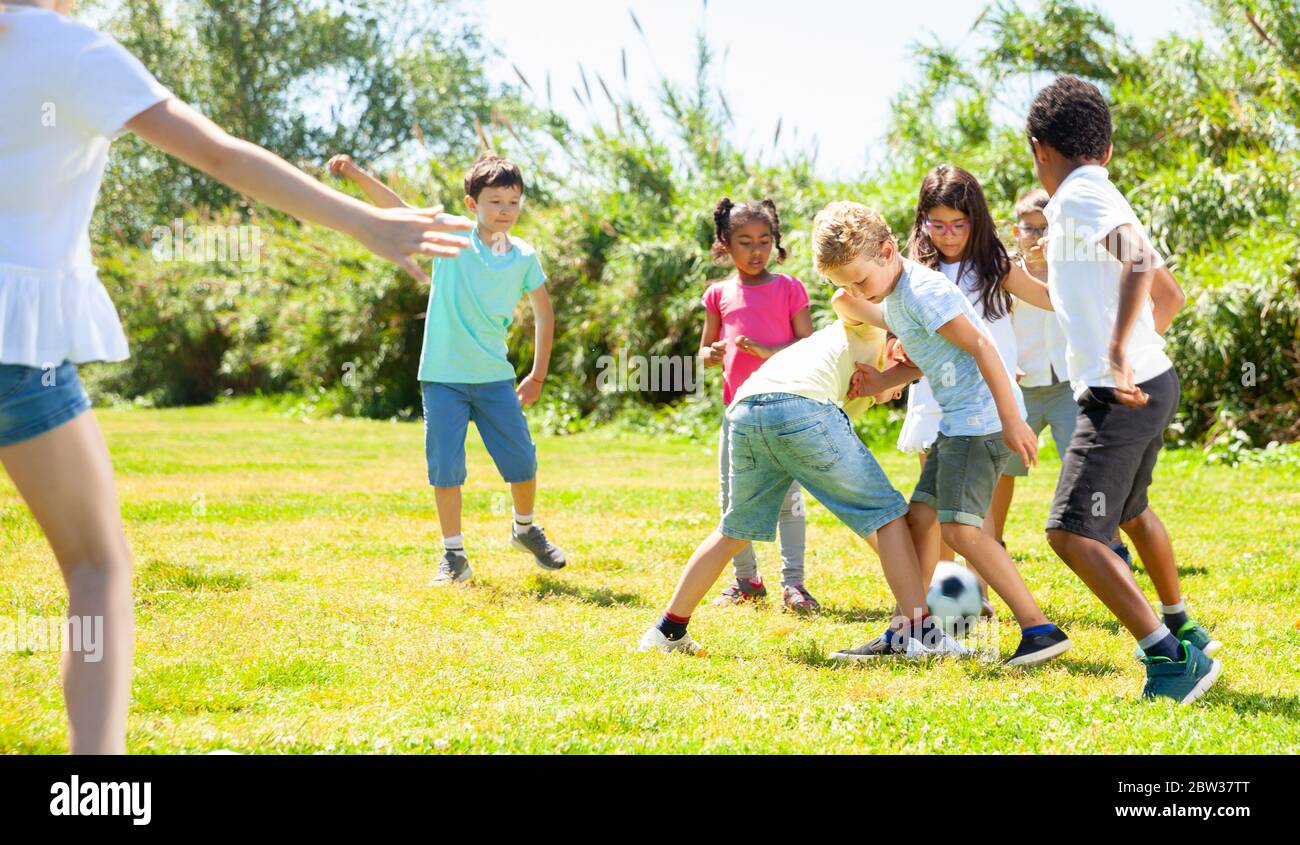 Energetic group happy children running hi-res stock photography and ...