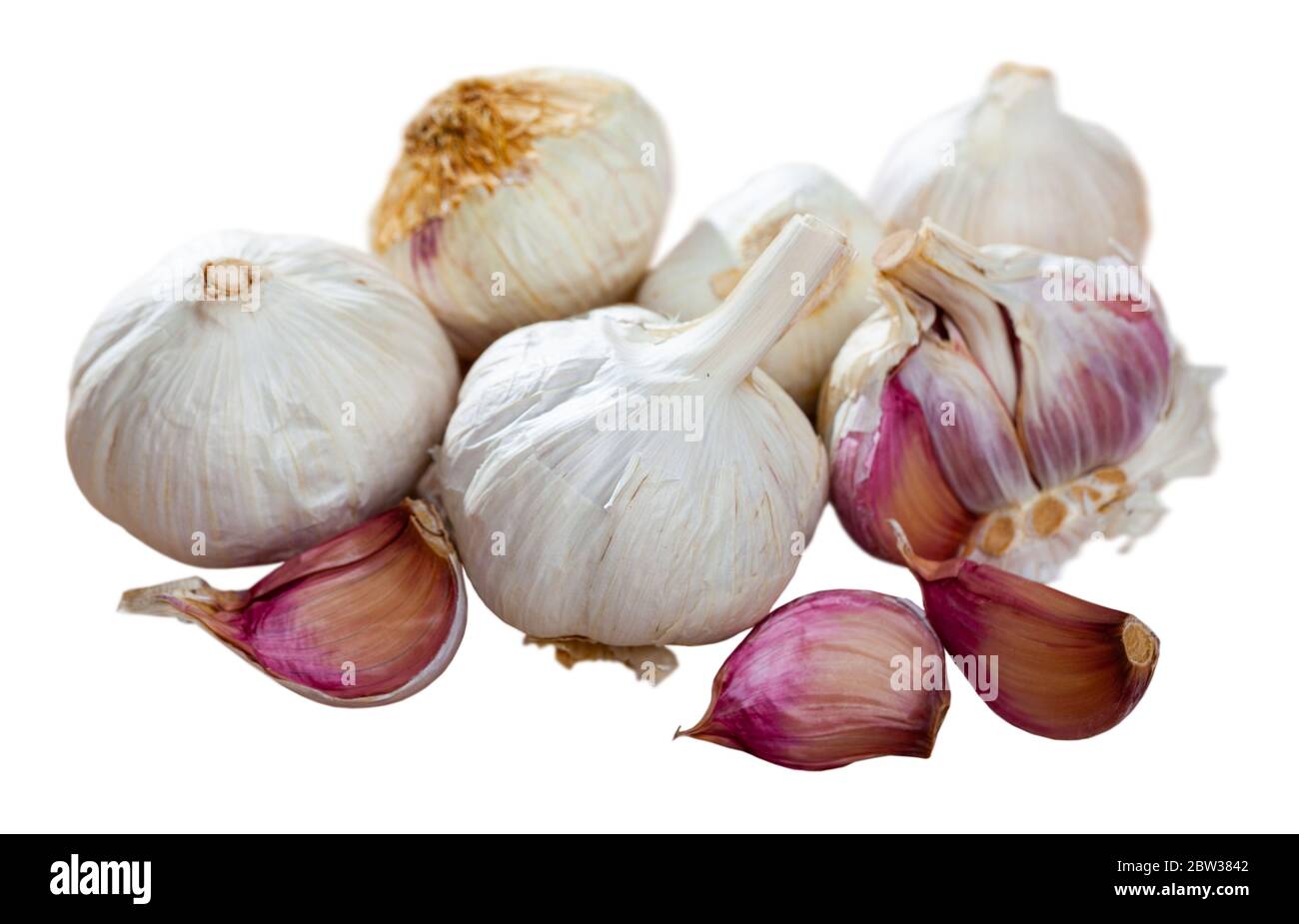 Whole raw garlic with separated cloves. Isolated over white background ...