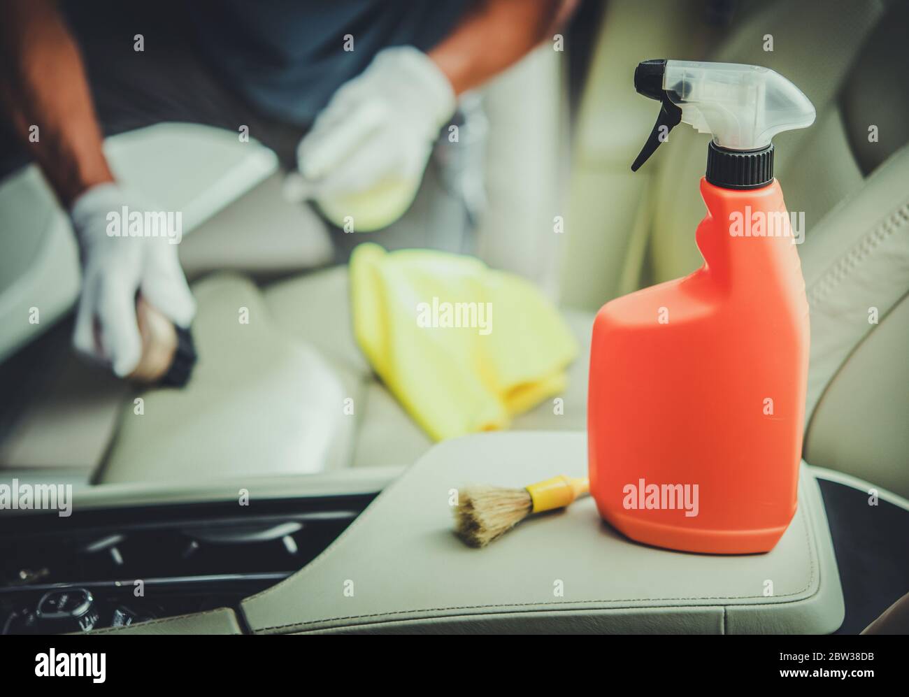 Caucasian Men Cleaning Vehicle Interior Using Specialized Sanitizing ...