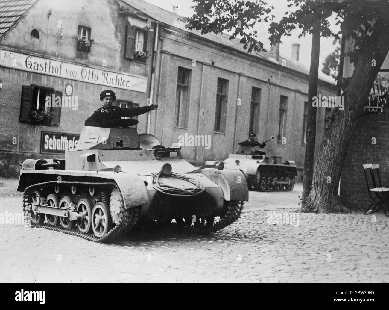 Germany ' s streets echo to road of tanks . The latest addition to the ...
