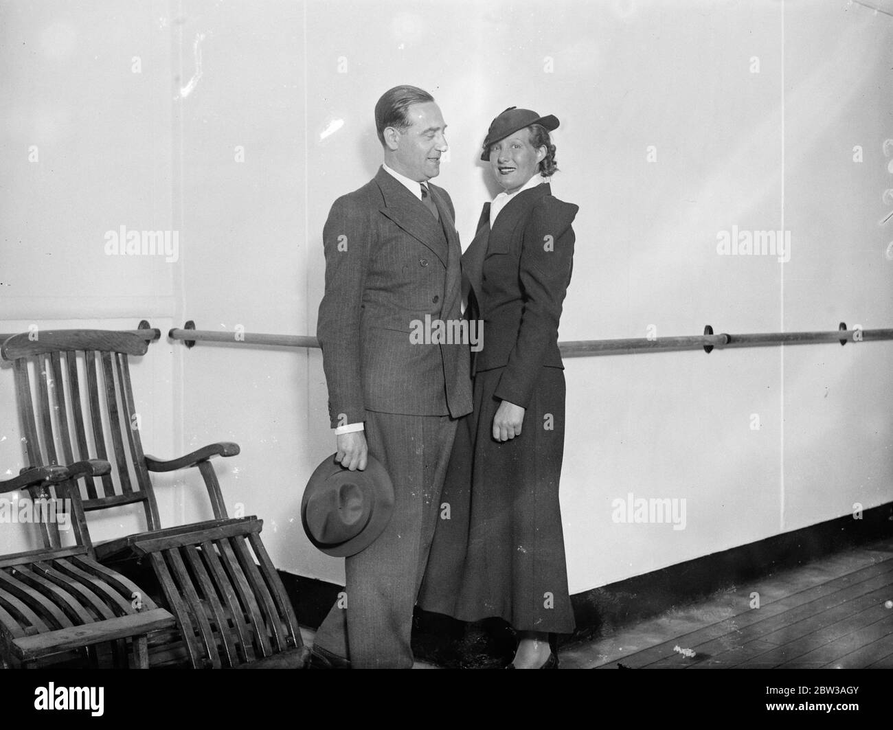 Binnie Barnes home again . Sent back from America because of a passport ...