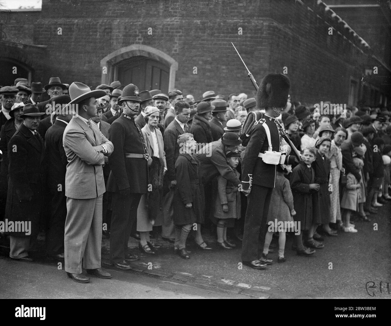 Mr George O ' Brien , the film actor , watching the changing of the ...