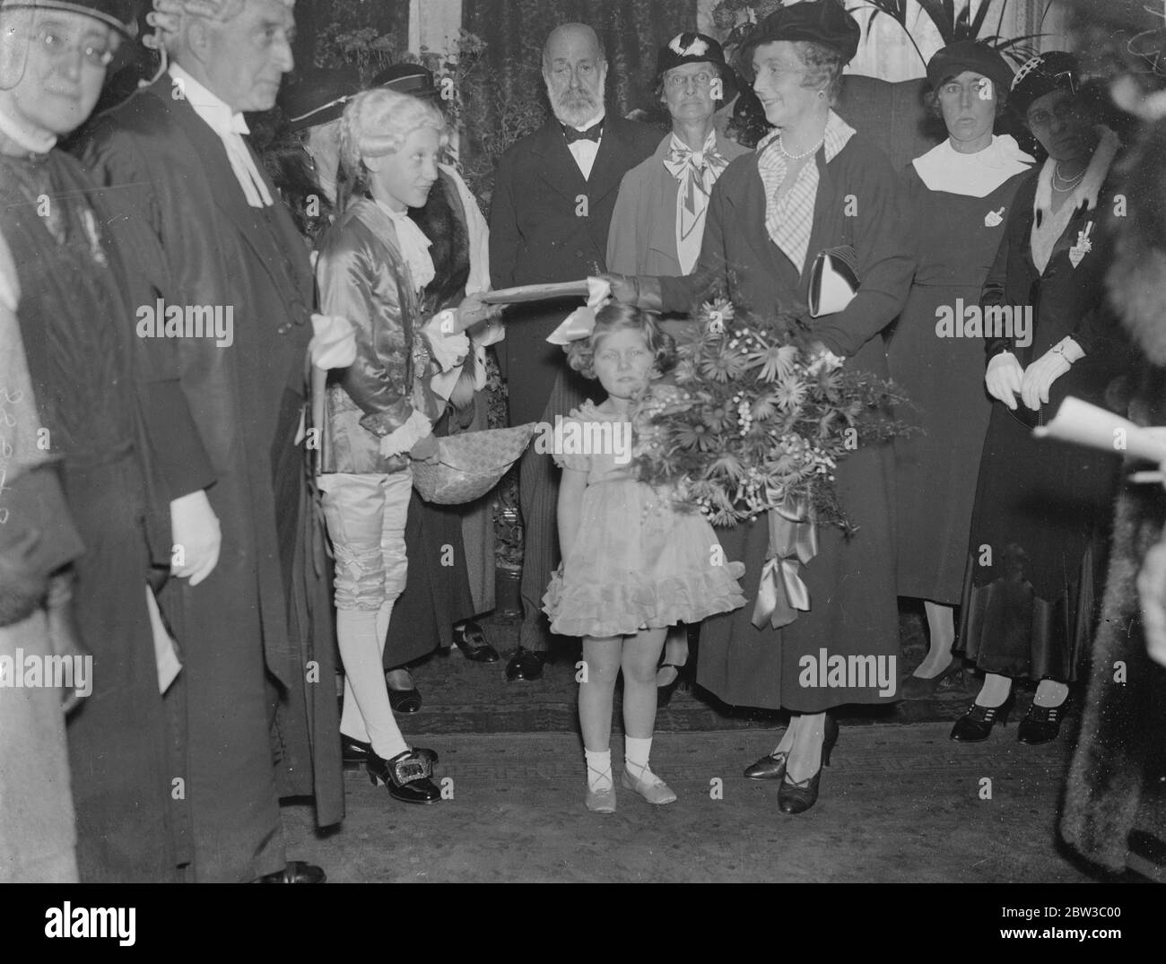 Princess Alice receives flowers as she opens the Georgian Bazaar . 20 ...