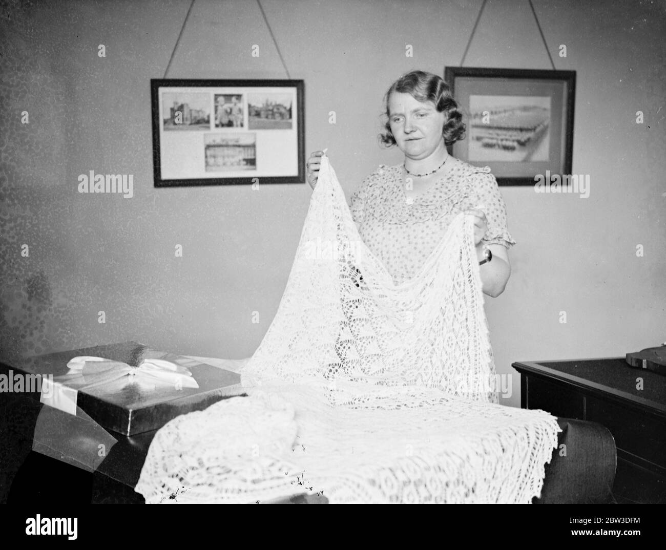 Blind girl presents shawl to Duchess of Kent 's baby . Miss Edith ...