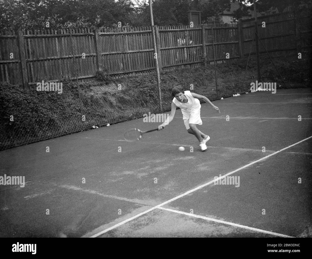 In play at Beckenham tennis semi finals . Miss Helen Cave in play ...