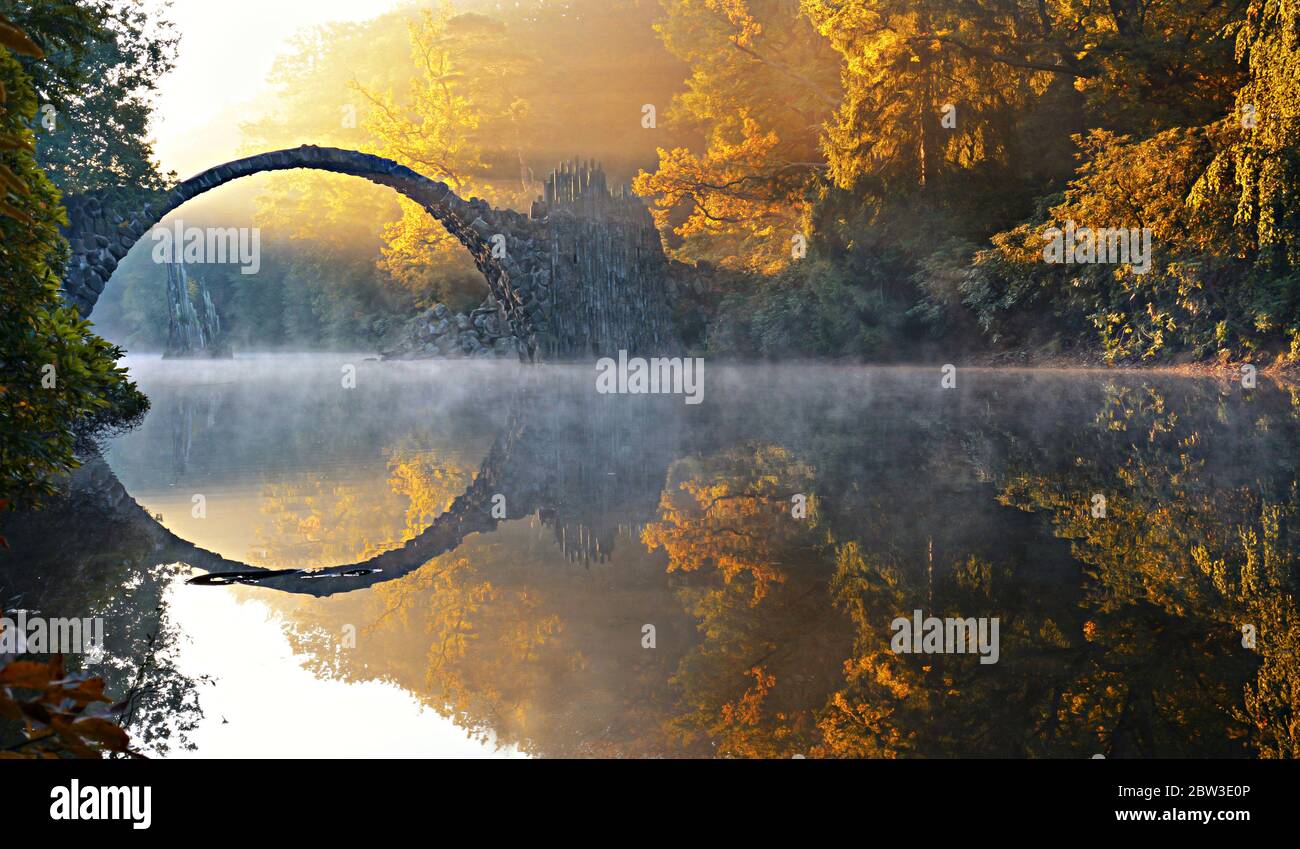 mysterious bridge in the morning mist Stock Photo - Alamy