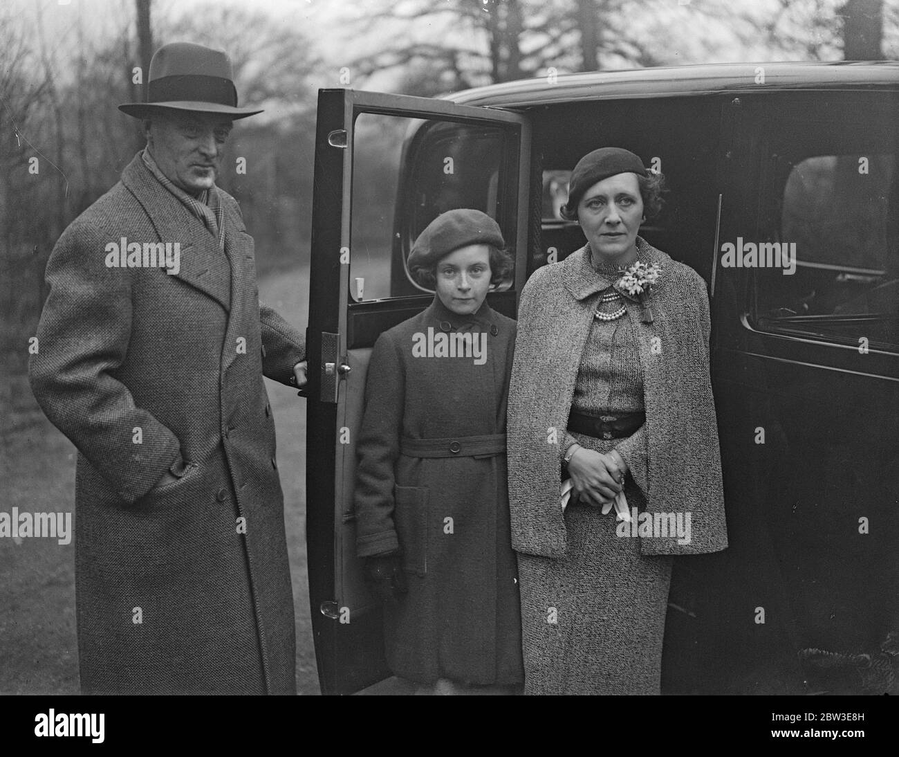 Sir Malcolm Campbell leaves Surrey home with wife and daughter for ...