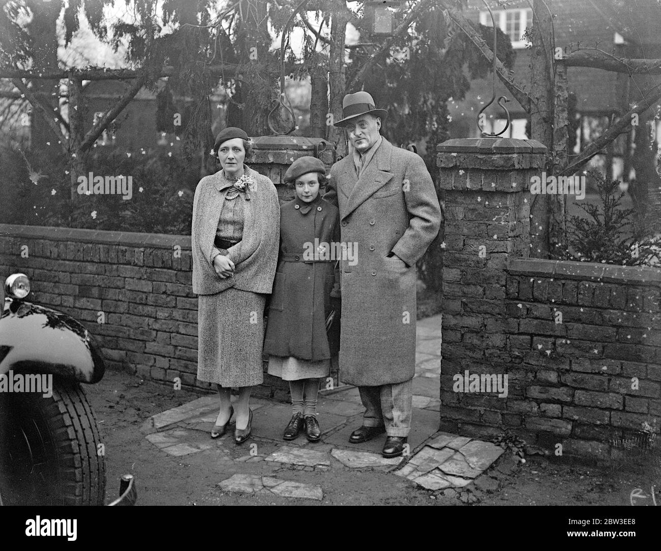 Sir Malcolm Campbell leaves Surrey home with wife and daughter for ...