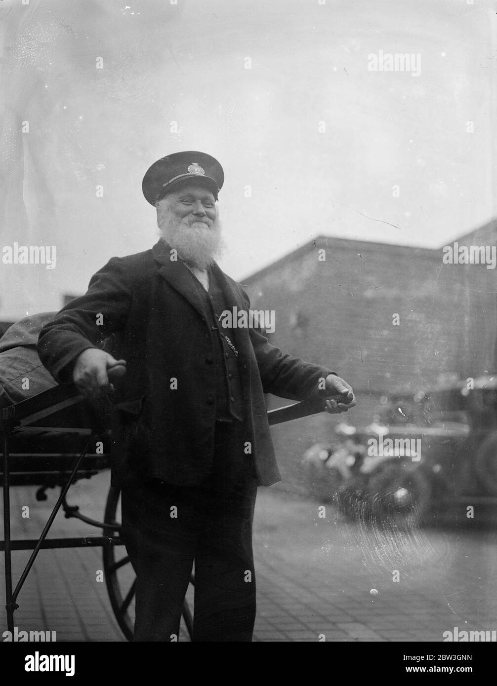 Old london postman Black and White Stock Photos & Images - Alamy
