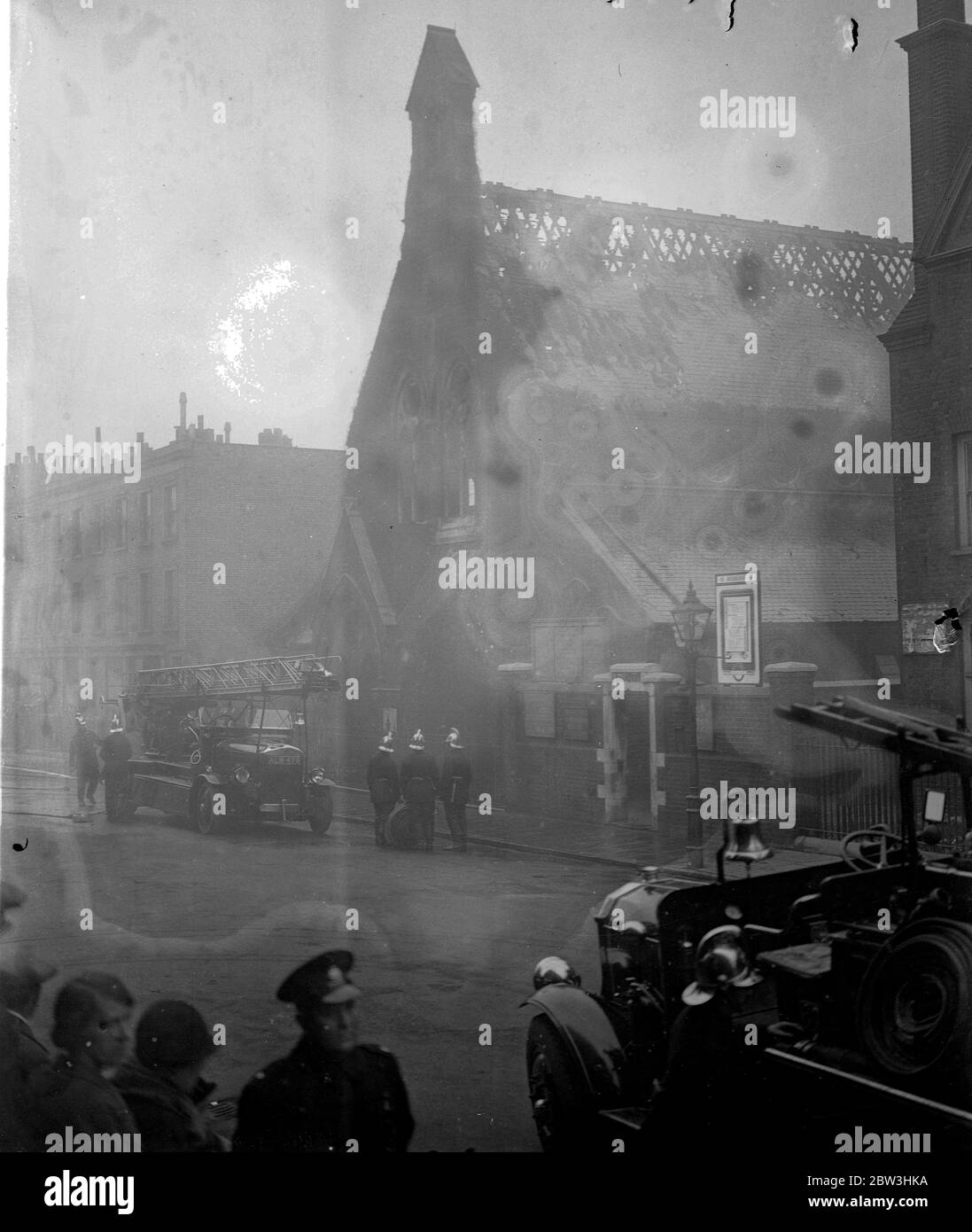 Firemen fight fire at London church . A hundred firemen with twenty ...