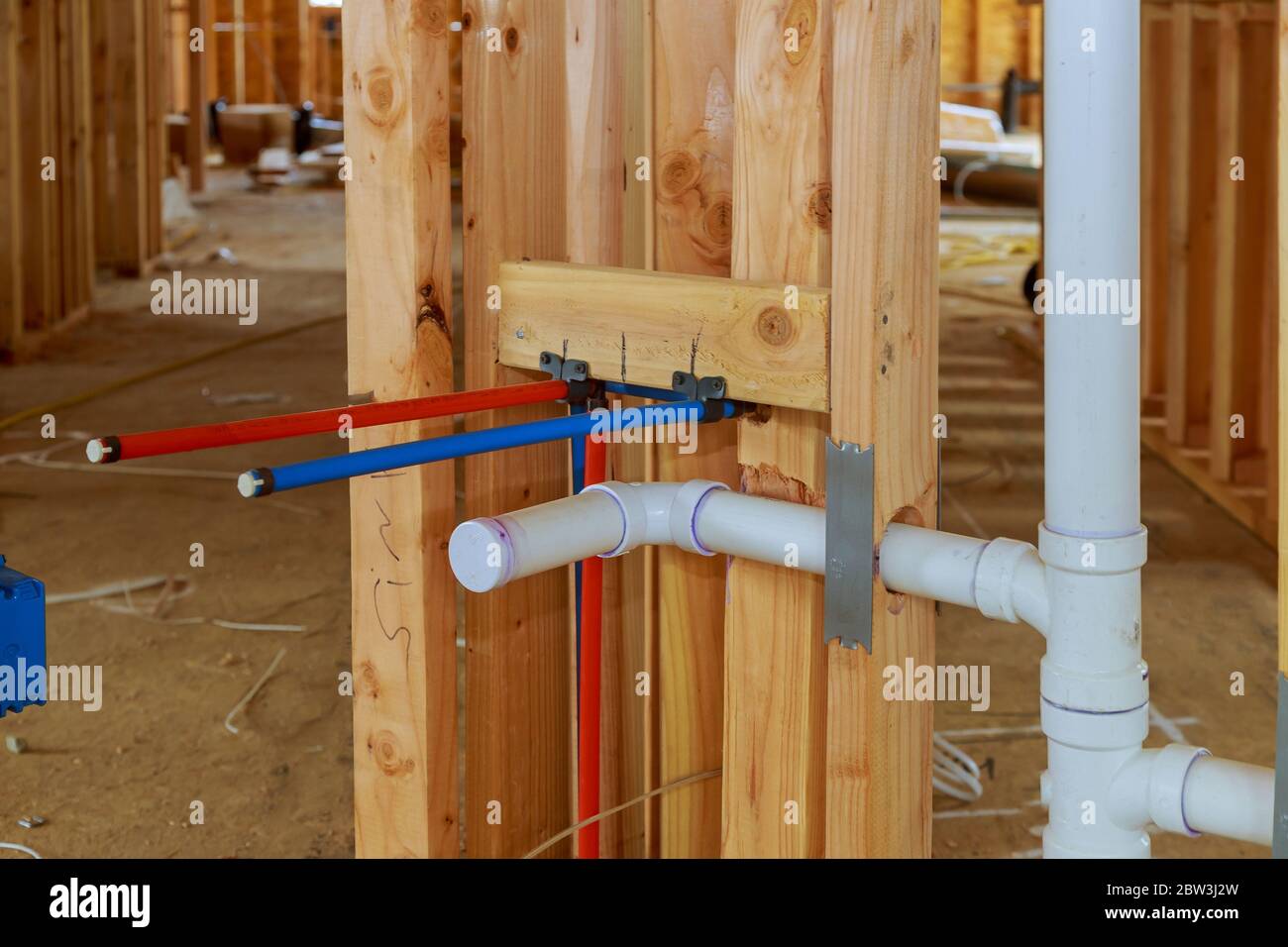New residential construction house framing a plumbing in the laundry ...