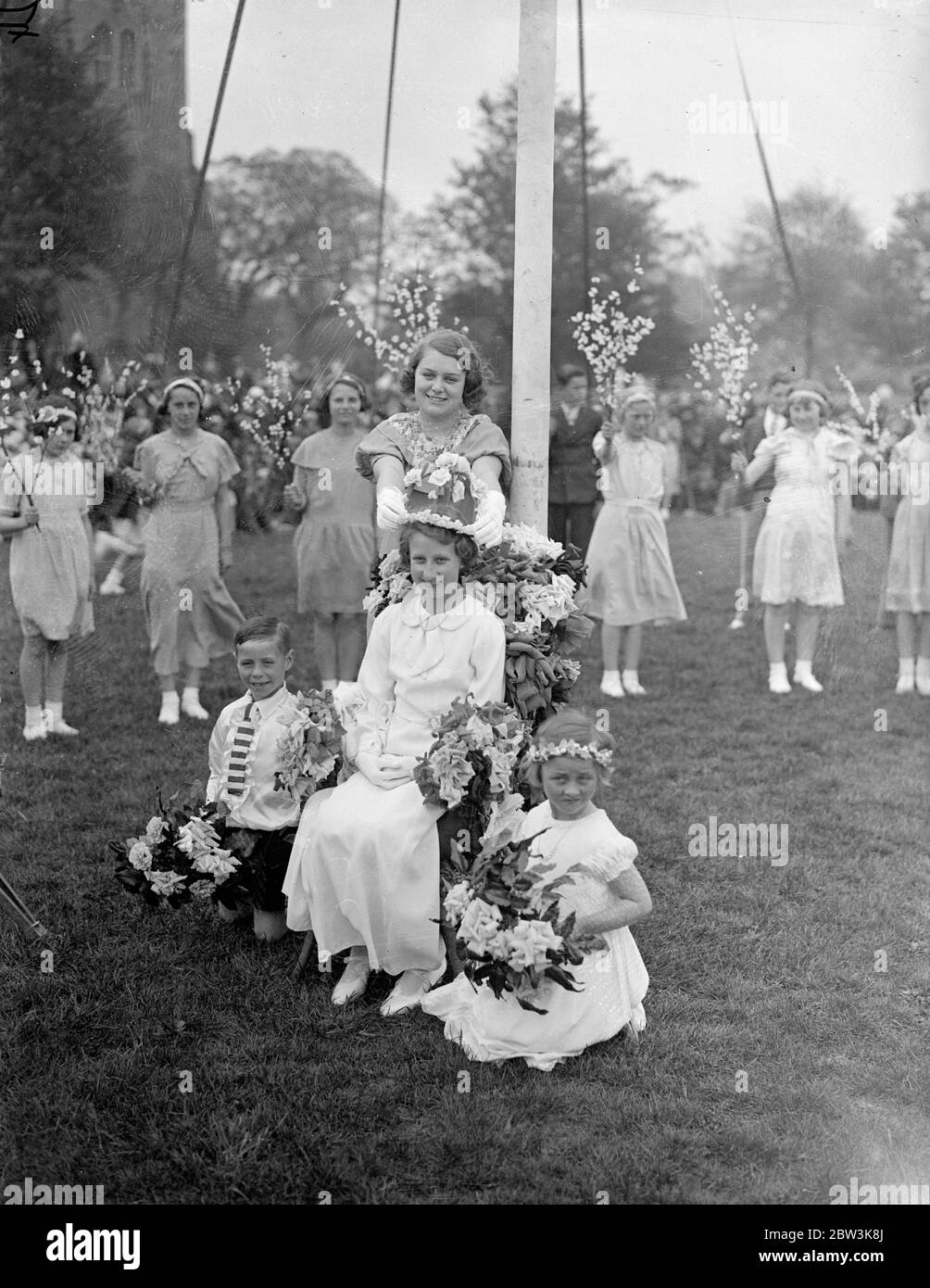 May Queen crowned in a Bedfordshire village . After a procession ...