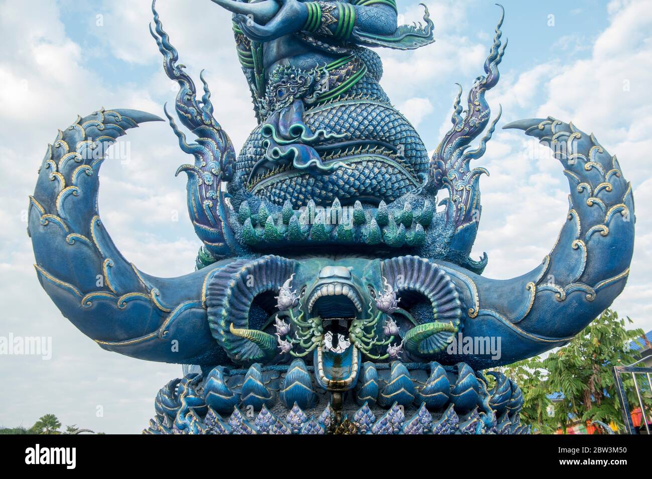 the Blue Temple or Wat Rong Suea Ten in the city of Chiang Rai in North Thailand. Thailand ...