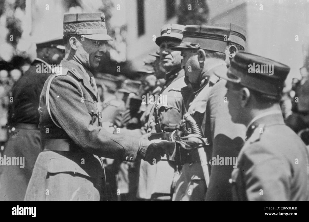 King George of Greece shakes hands with his officers . King George of ...