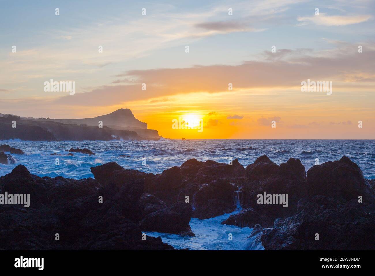 Lava stones on the beach of Piscinas Naturais Biscoitos. Atlantic Ocean ...