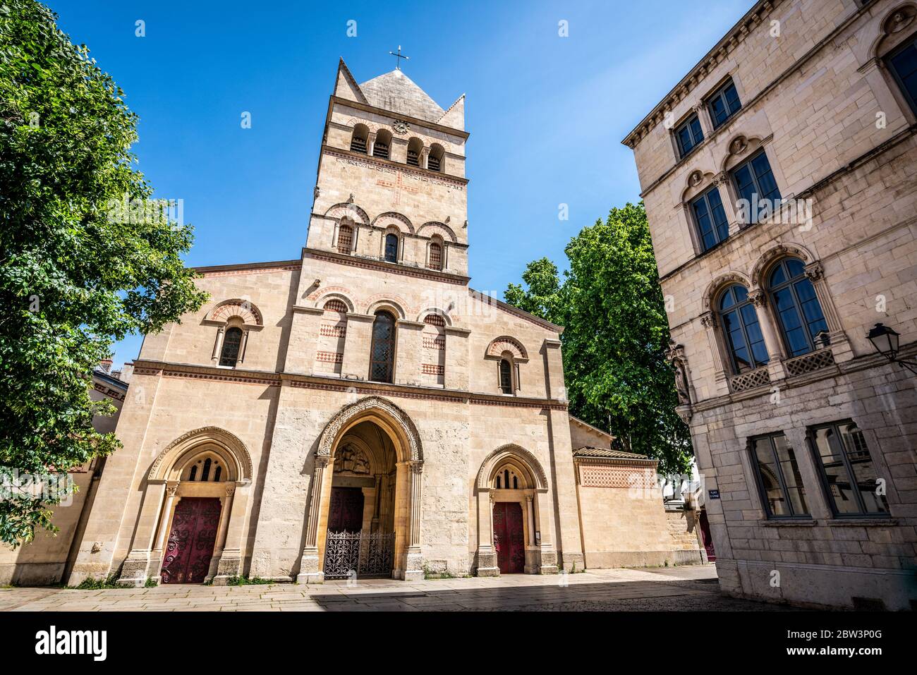 Front view of the Basilica of Saint-Martin d’Ainay a Romanesque church ...