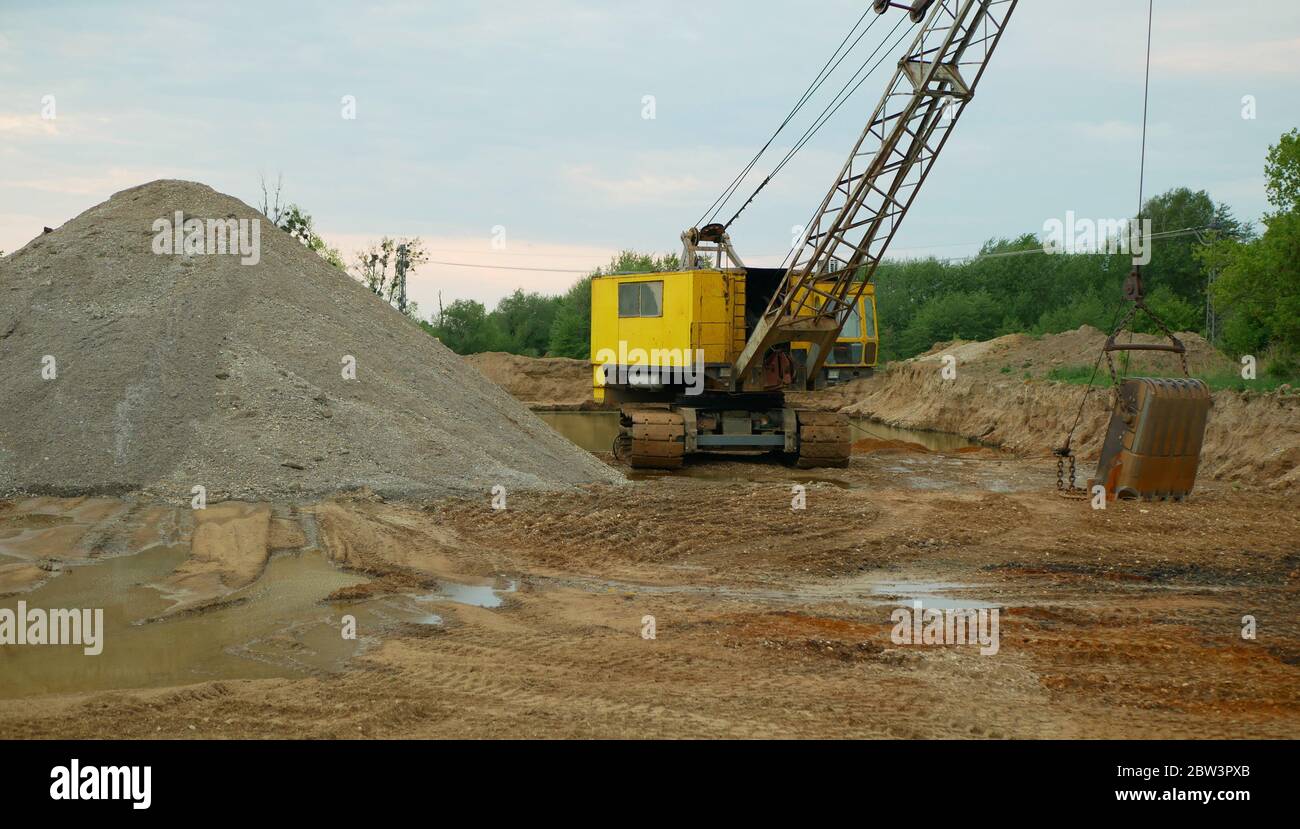Mining for gravel sand pit excavator or digger machine dredger ...