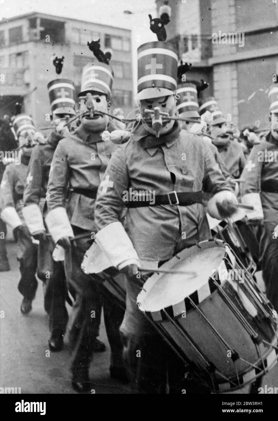 Wax masked drummers lead annual Basle festival procession . Weird ...