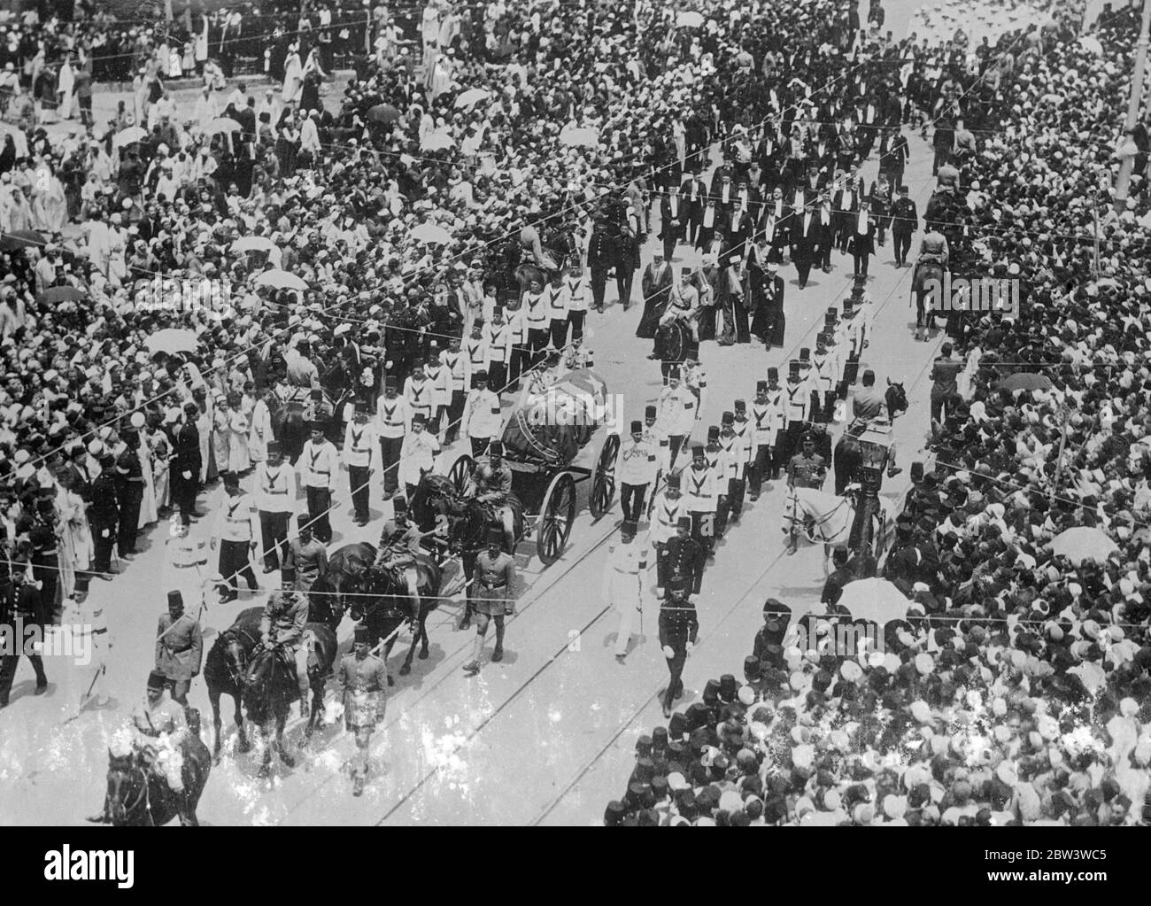 King Fuad of Egypt buried in Cairo . Dense crowds pack five mile route ...