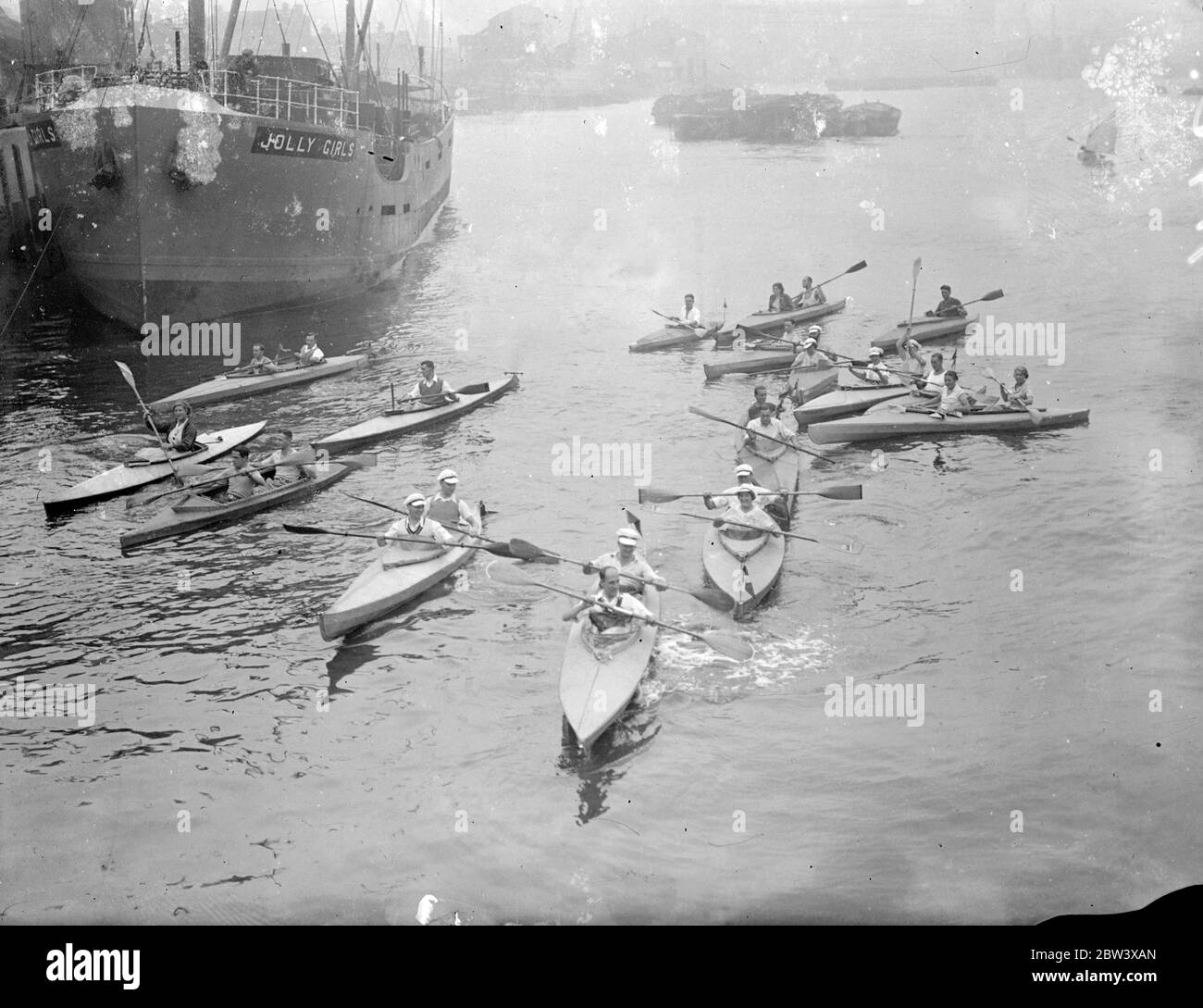 Canoes on river in Black and White Stock Photos & Images - Alamy
