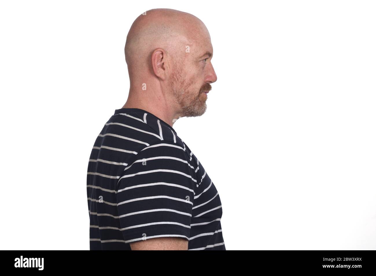 portrait of a man side veiw on white background Stock Photo - Alamy